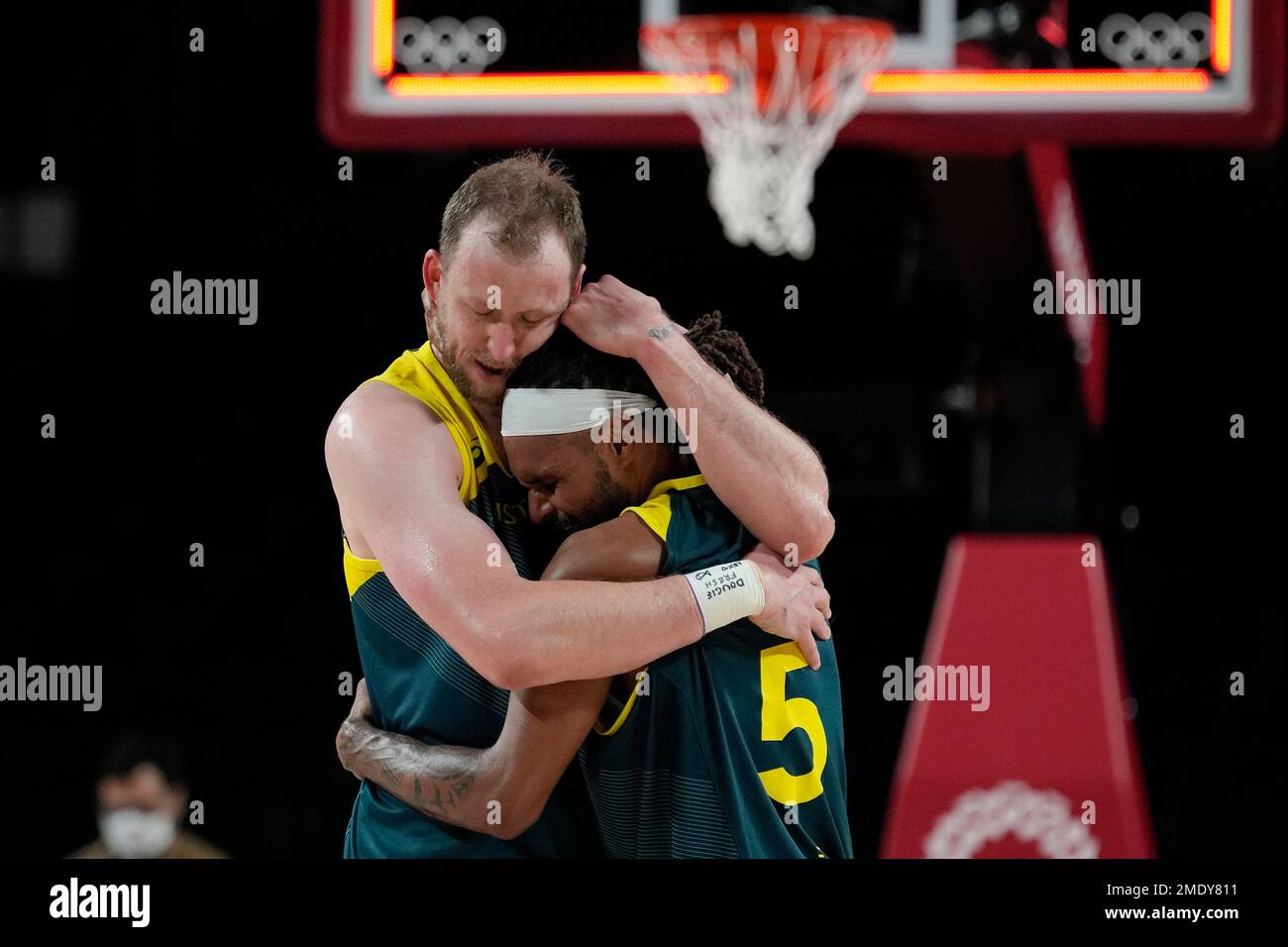 Australia's Joe Ingles (7) and Patty Mills (5) react after beating ...