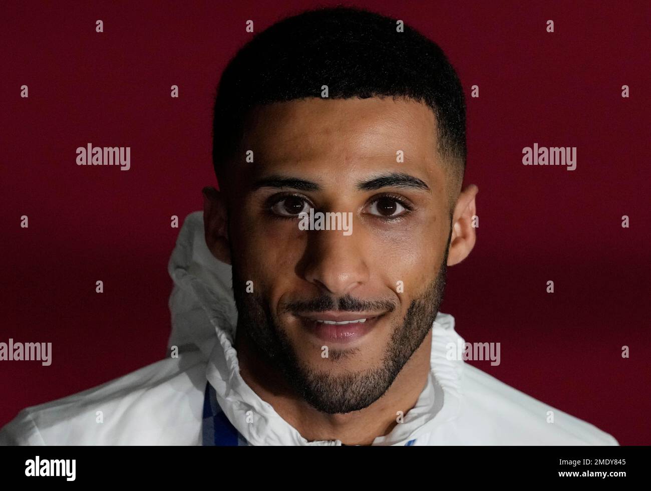 Britain's Galal Yafai bites his gold medal talks to journalist after ...