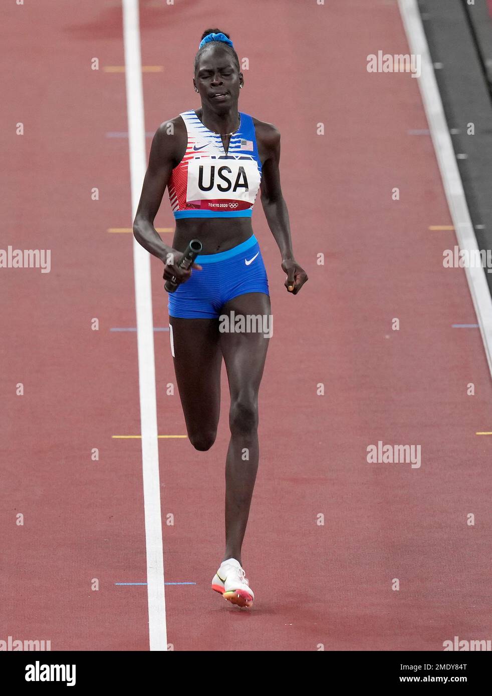 Athing Mu, of United States anchors her team to the gold medal in the ...