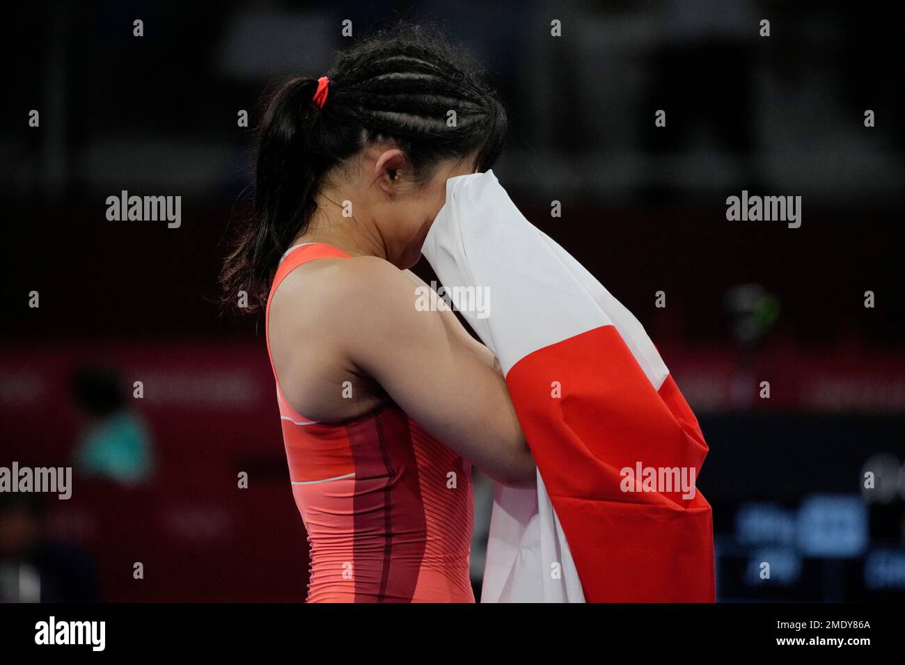 Japan's Yui Susaki celebrates after defeating China's Sun Yanan during ...