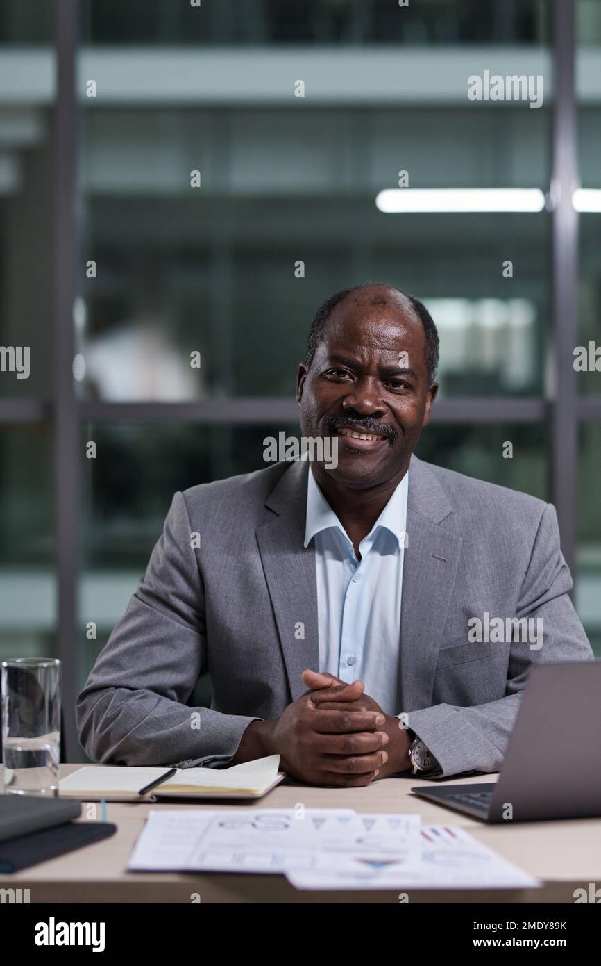 Successful mature African American male director of business company ...