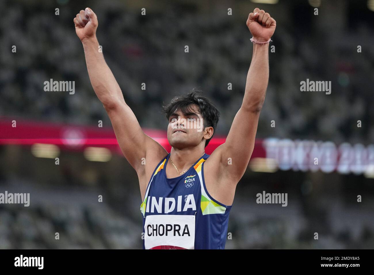 Neeraj Chopra, of India, celebrates after winning the gold medal in the ...