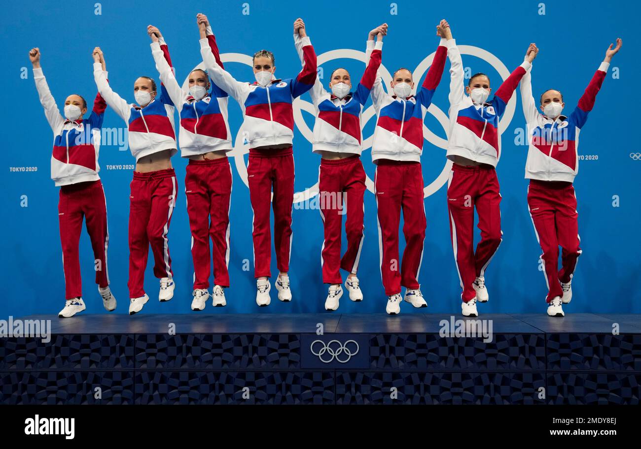 Team of Russian Olympic Committee celebrate their gold medal after Team ...