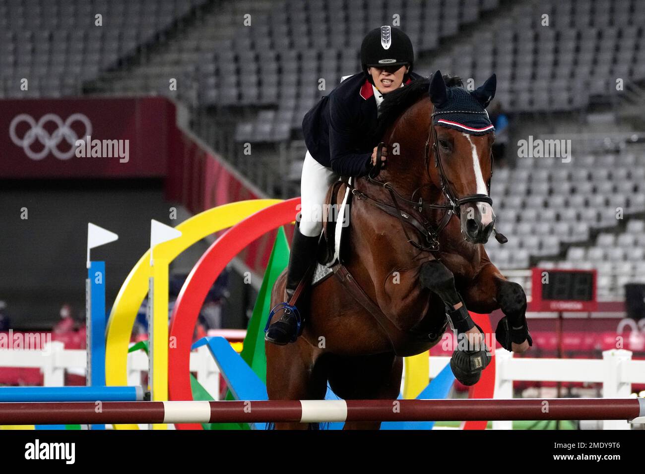 Joseph Choong of Britain competes in the equestrian portion of the men ...