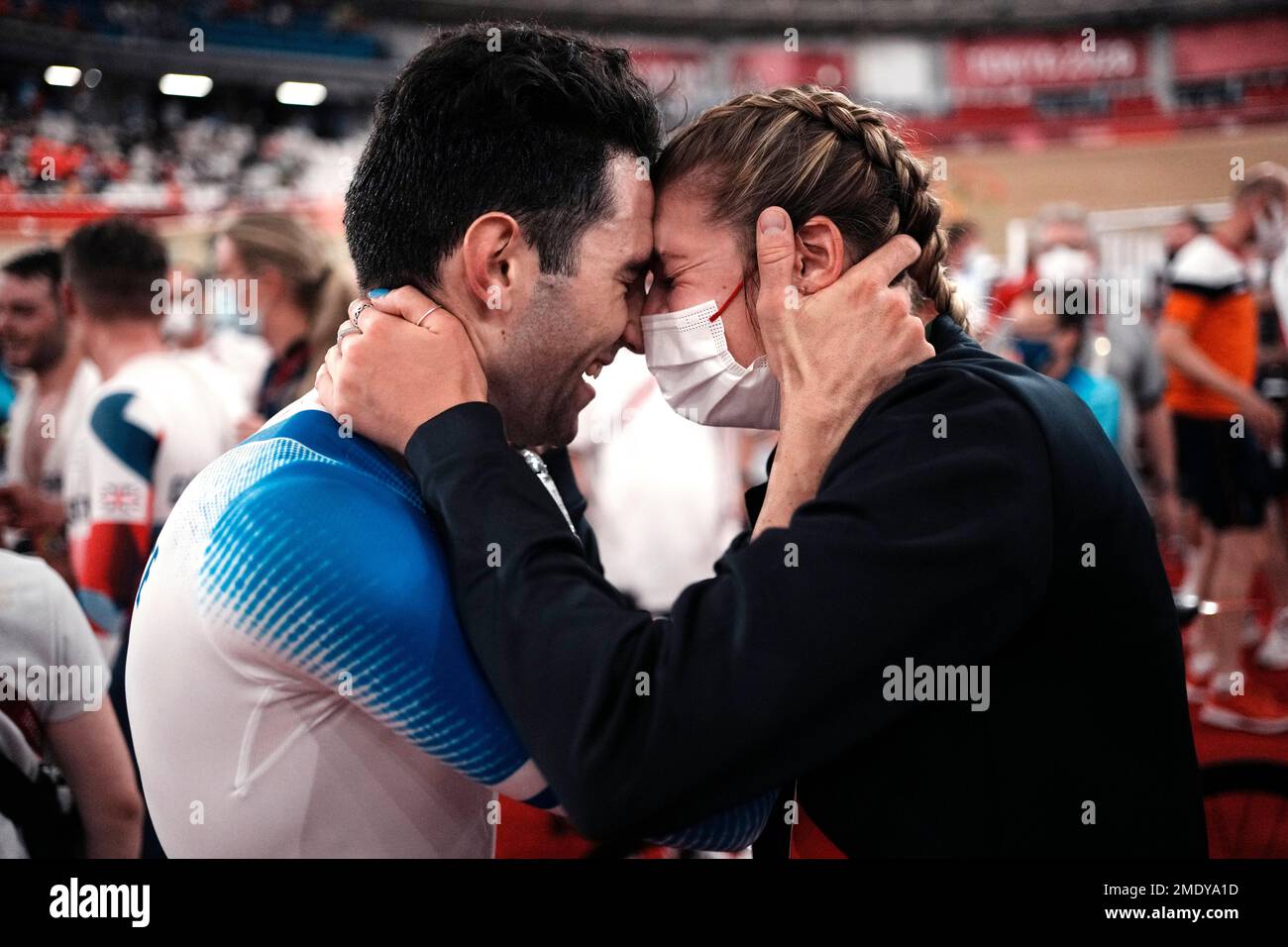 Benjamin Thomas of Team France embraces his girlfriend Martina Alzini after winning the bronze ...
