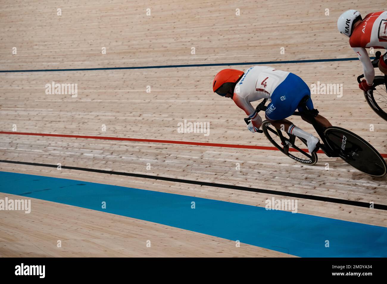 competes during the track cycling men's madison race at the 2020 Summer ...