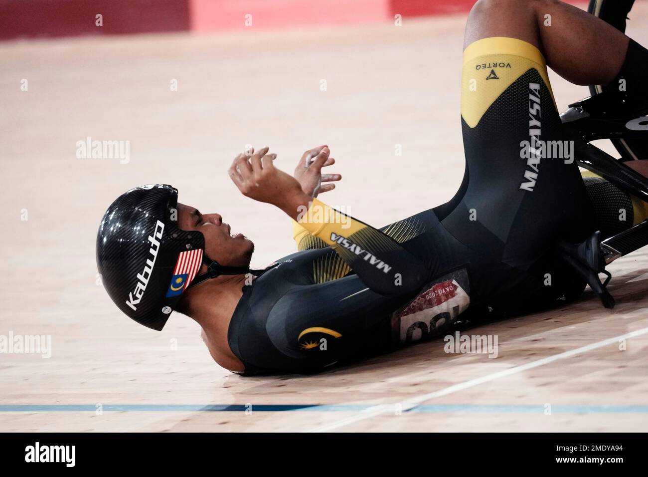 Muhammad Shah Firdaus Sahrom of Team Malaysia crashes during the track ...