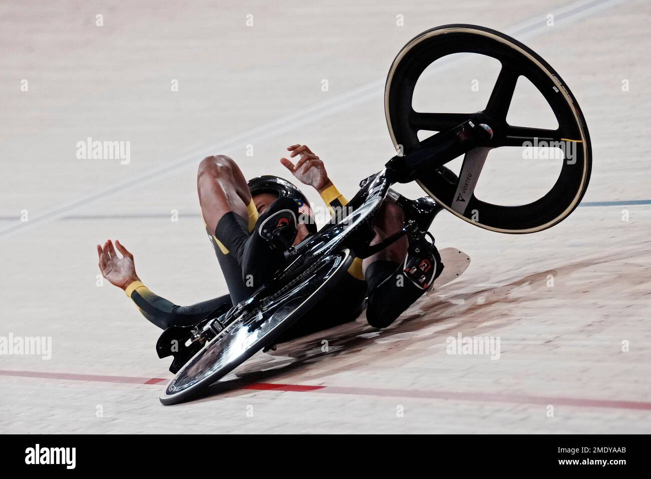 Muhammad Shah Firdaus Sahrom of Team Malaysia crashes during the track ...