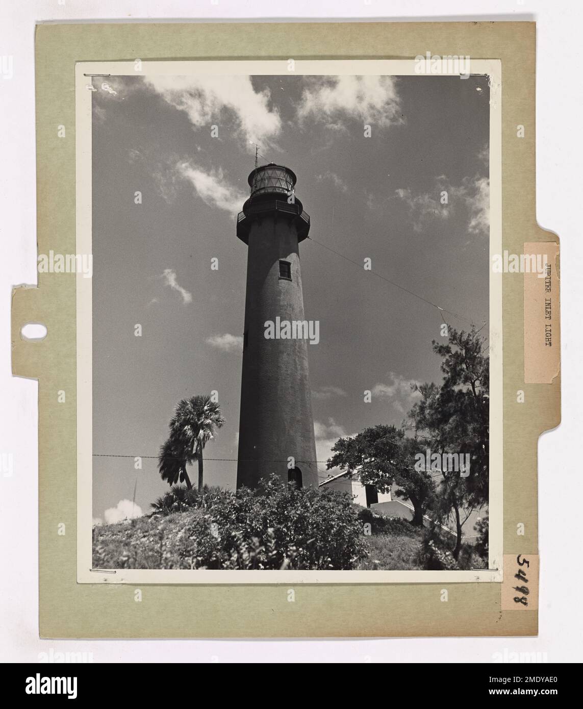 The Jupiter Inlet Light, a 105-foot red brick tower in Florida, marks a ...
