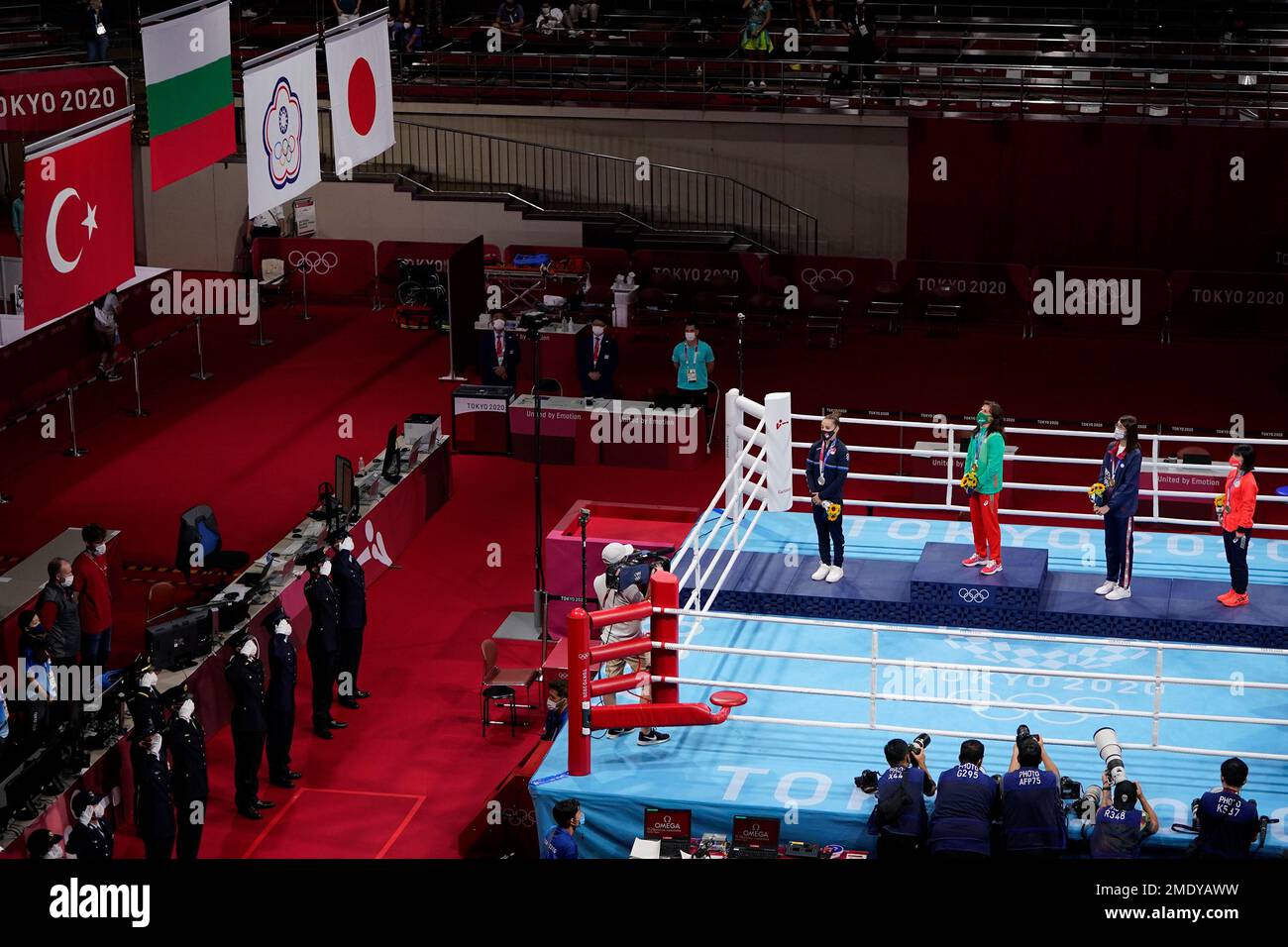 Silver medal Turkey's Buse Naz Cakiroglu, left, gold medal winner ...