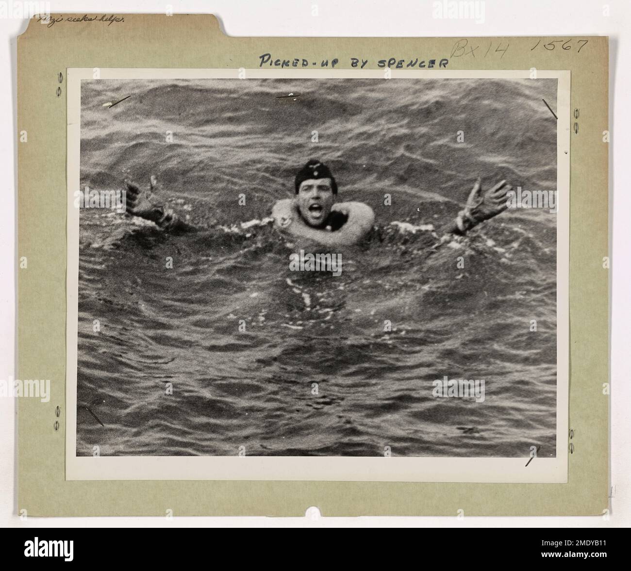 A German sailor is seen in the ocean after his submarine was sunk by ...