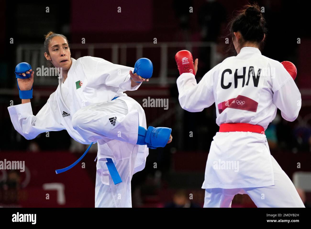 Lamya Matoub of Algeria, left, and Gong Li of China compete in the ...