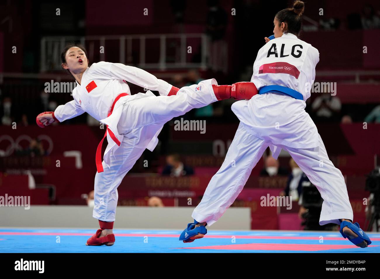 Gong Li of China, left, and Lamya Matoub of Algeria compete in the ...