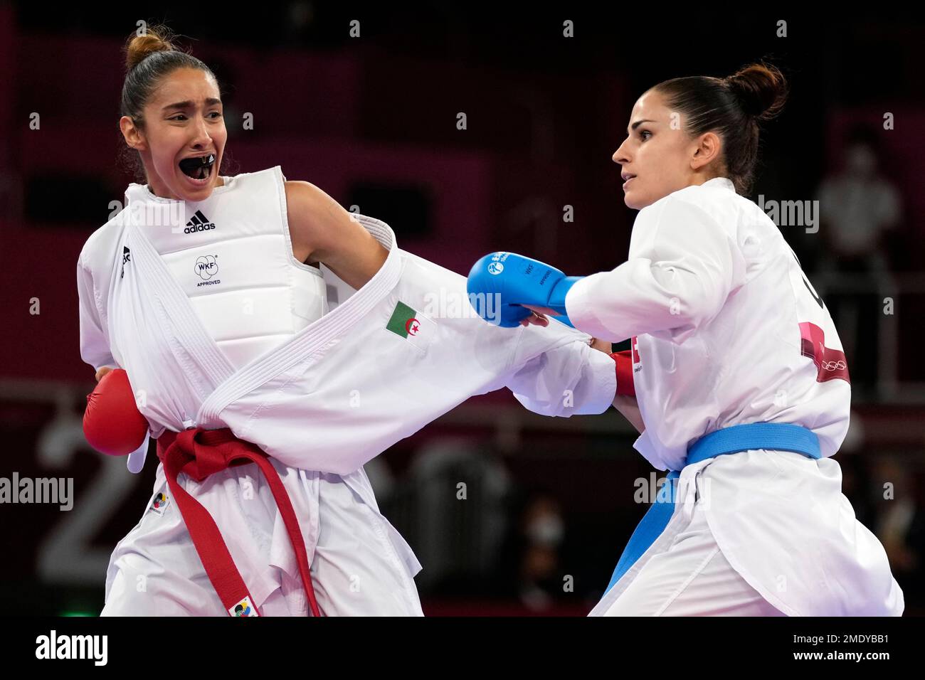 Lamya Matoub of Algeria, left, and Elena Quirici of Switzerland compete ...