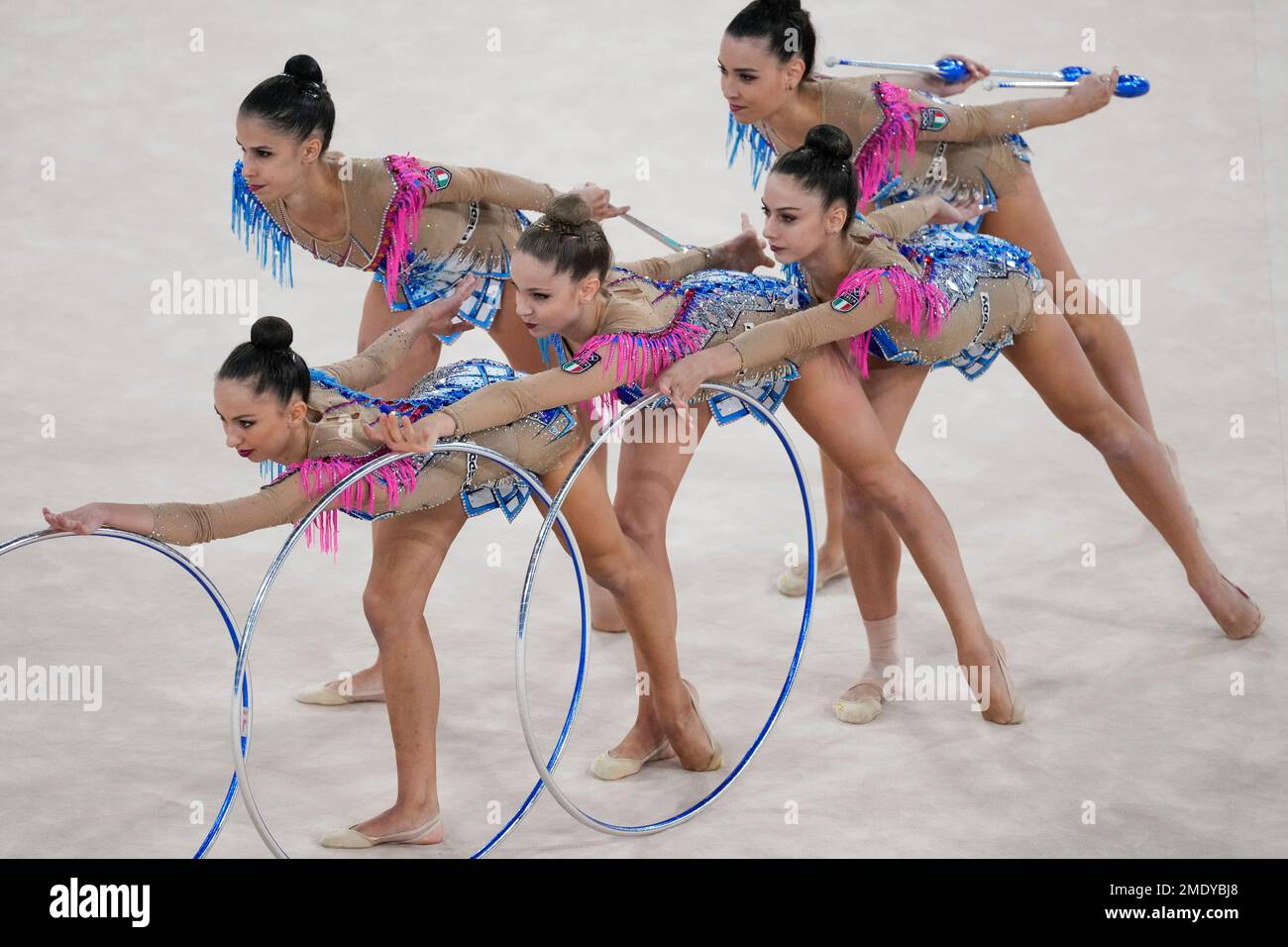Gymnasts from Italy perform during the rhythmic gymnastics group all ...