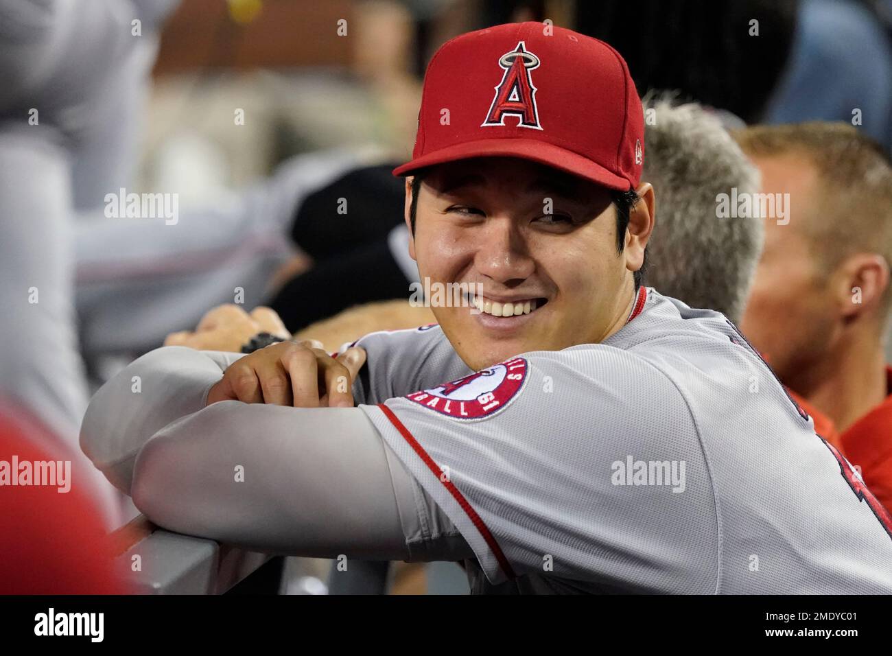 Los Angeles Angels' Shohei Ohtani smiles in the dugout during the fifth ...