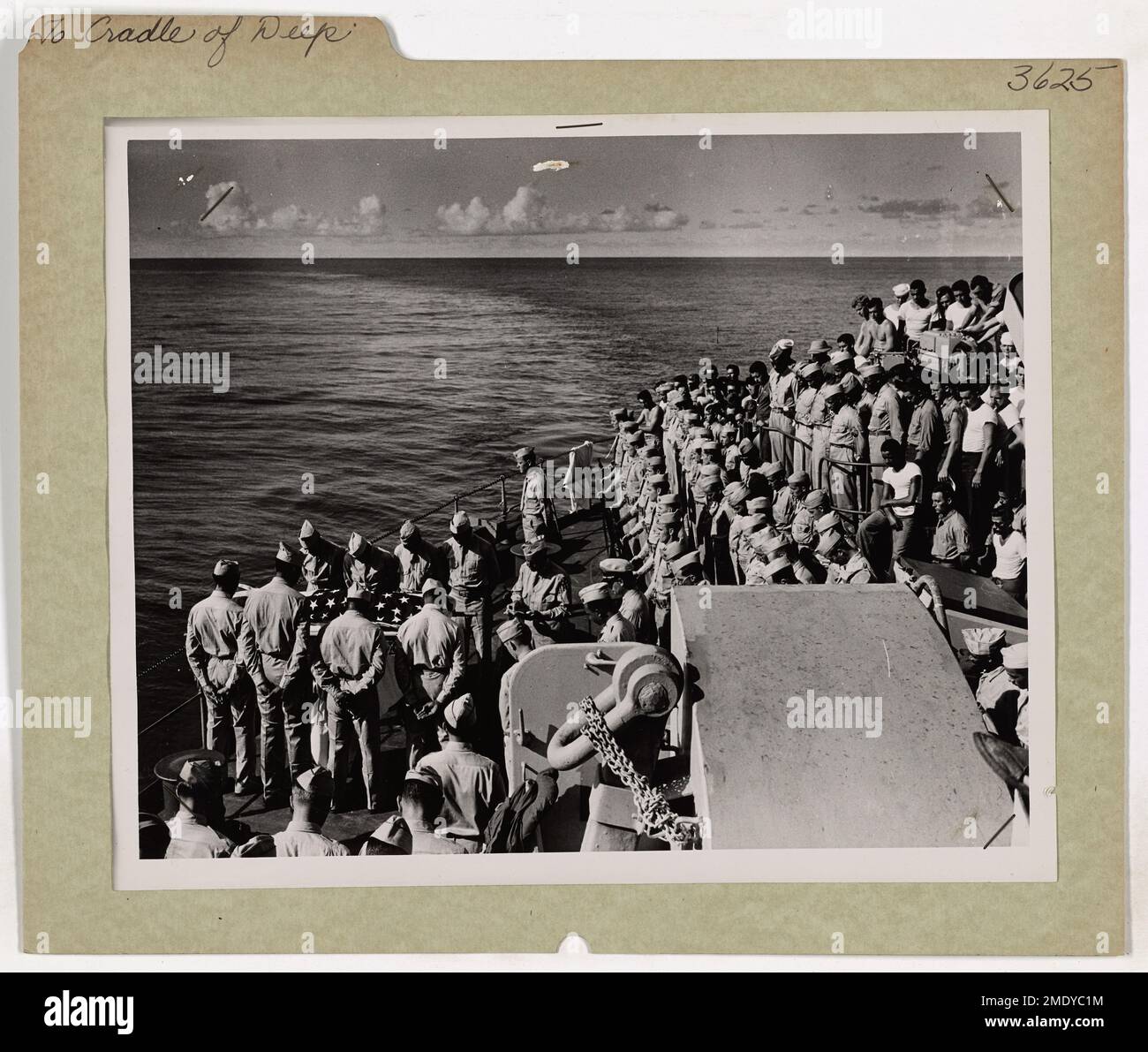 To The Cradle of the Deep. All hands bow their heads in prayer as a ...