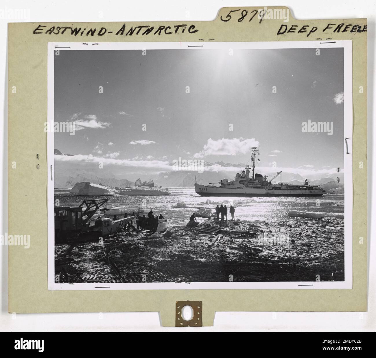 The U.S. Coast Guard icebreaker Eastwind unloads supplies at Cape ...