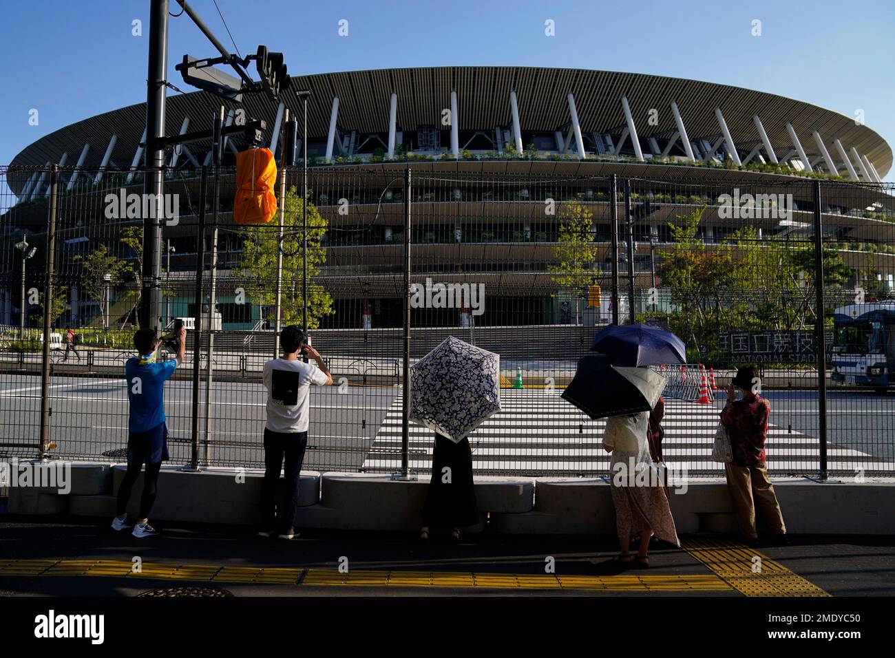 FILE. - In this Aug. 1, 2021, file photo, Spectators view the Olympic ...