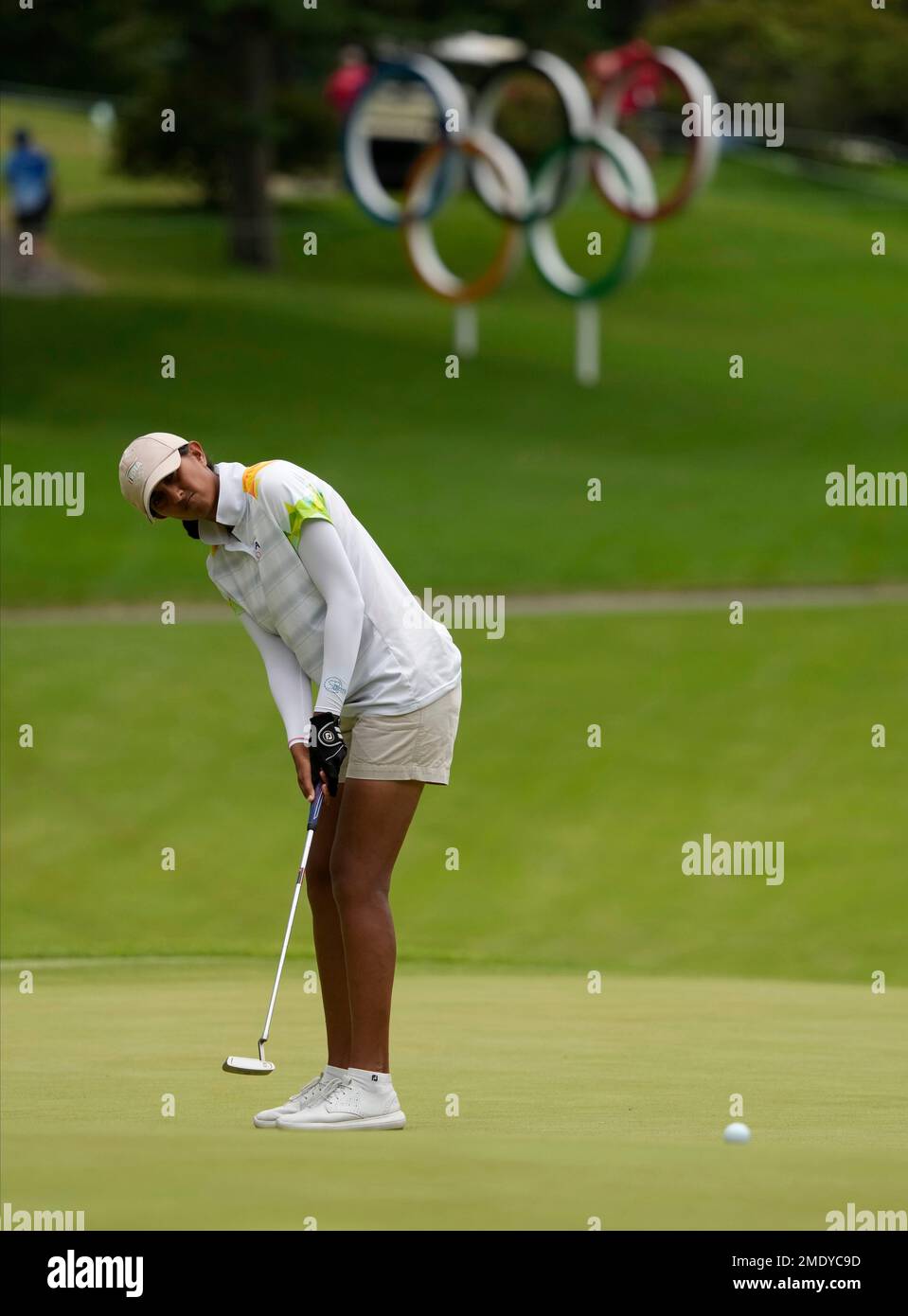 Aditi Ashok, of India, makes a putt on the 16th hole during the final ...