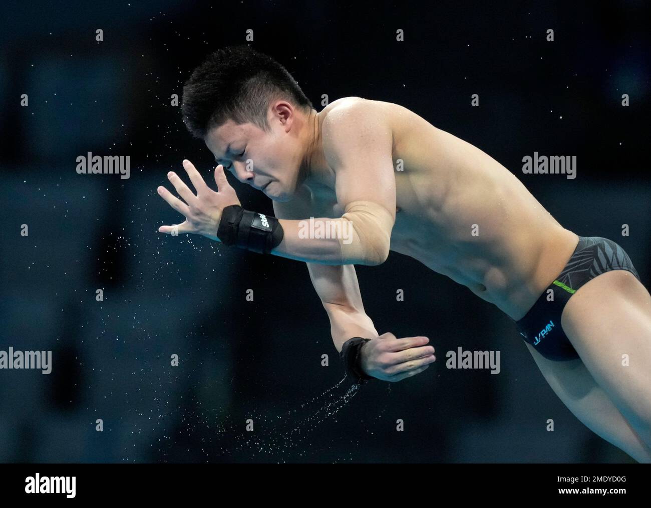 Rikuto Tamai of Japan competes in men's diving 10m platform semifinal ...