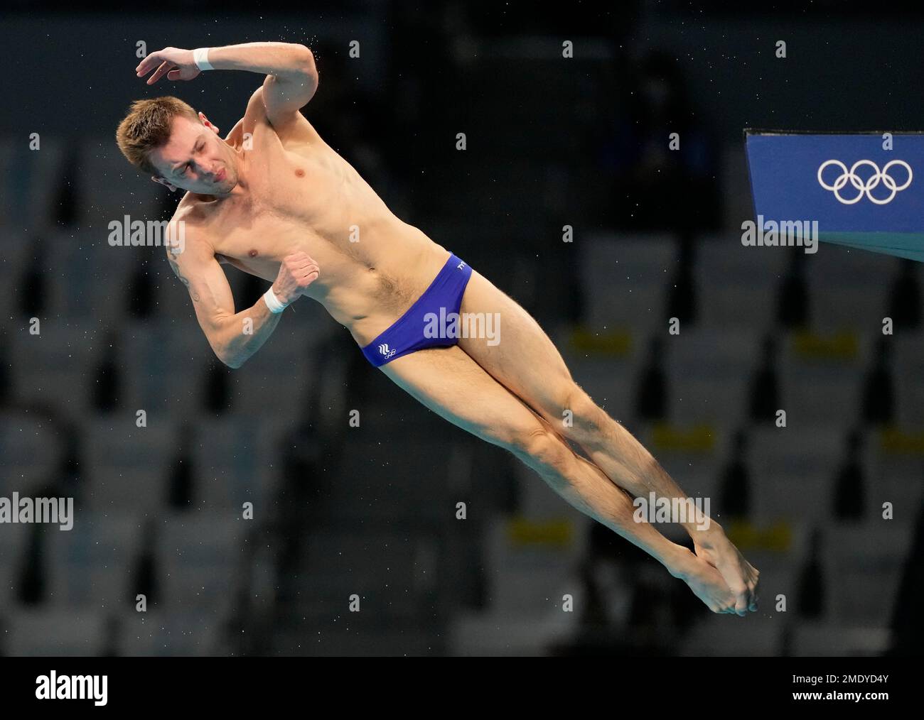 Viktor Minibaev of Russian Olympic Committee competes in men's diving ...