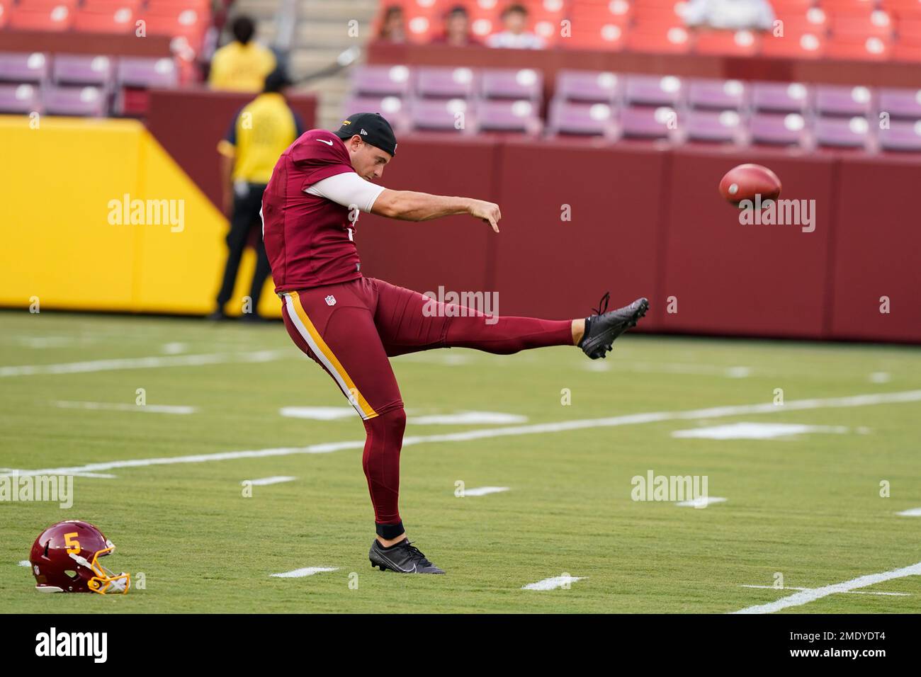 Washington Football Team punter Tress Way boots the ball during an NFL ...