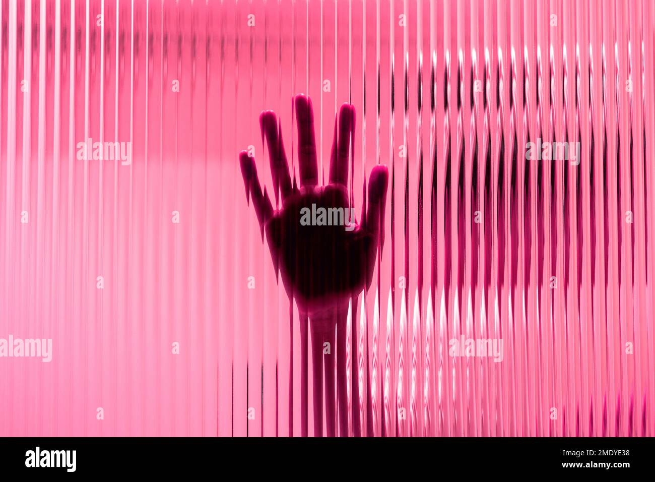 One hand on the textured glass Stock Photo - Alamy