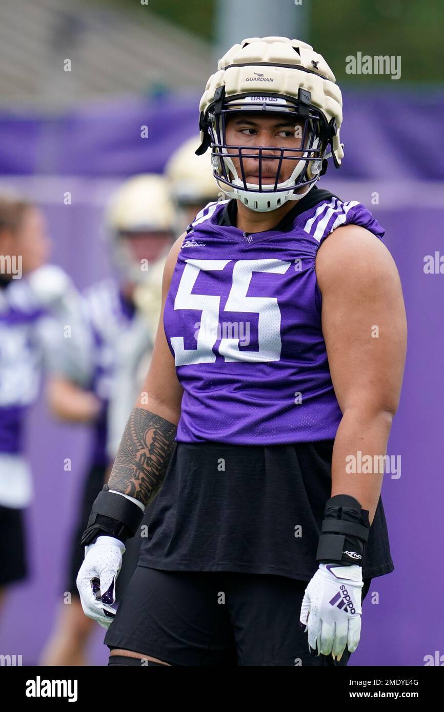 Washington offensive lineman Troy Fautanu looks on during an NCAA ...