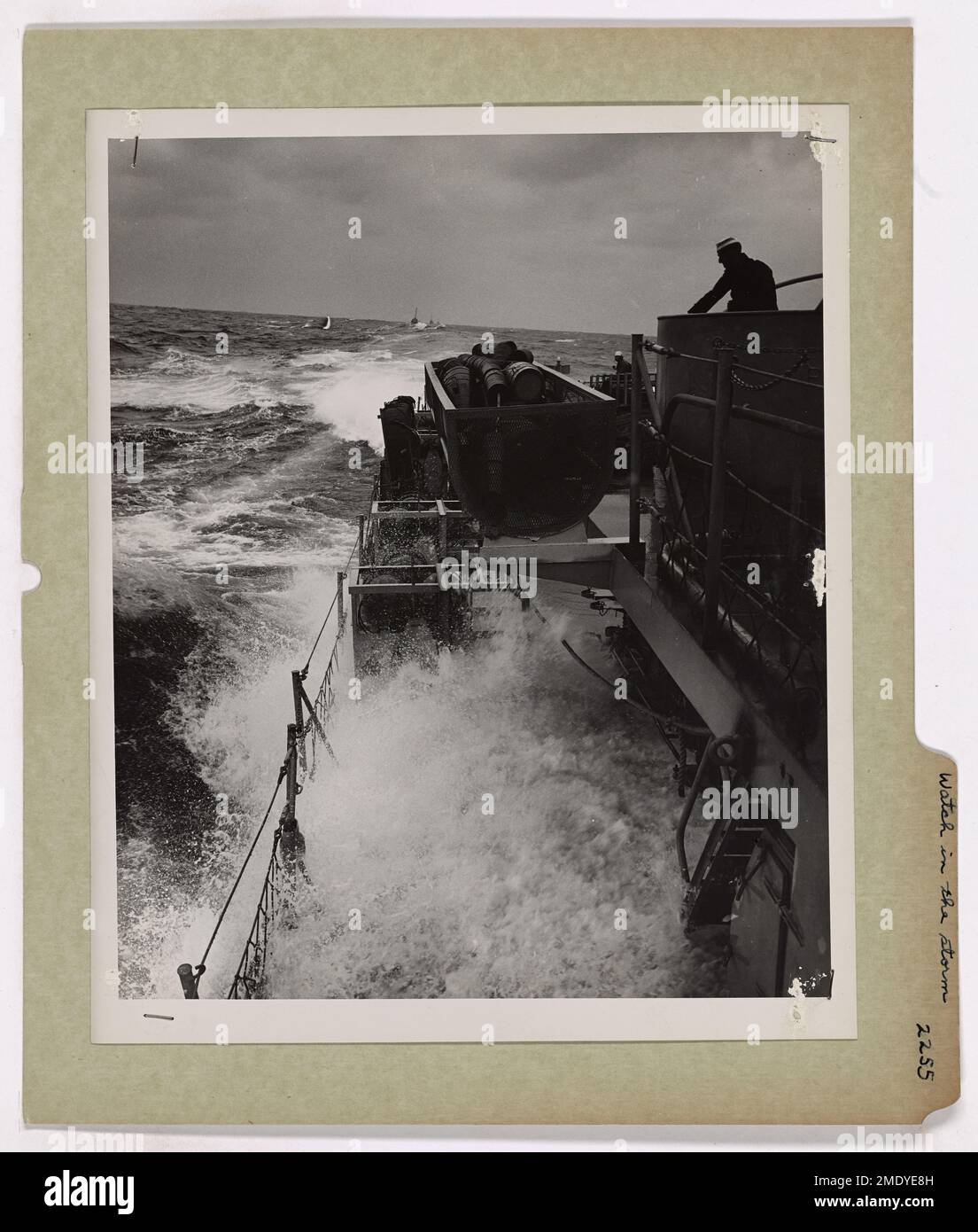 A Coast Guardsman stands watch aboard a patrol frigate in the North ...