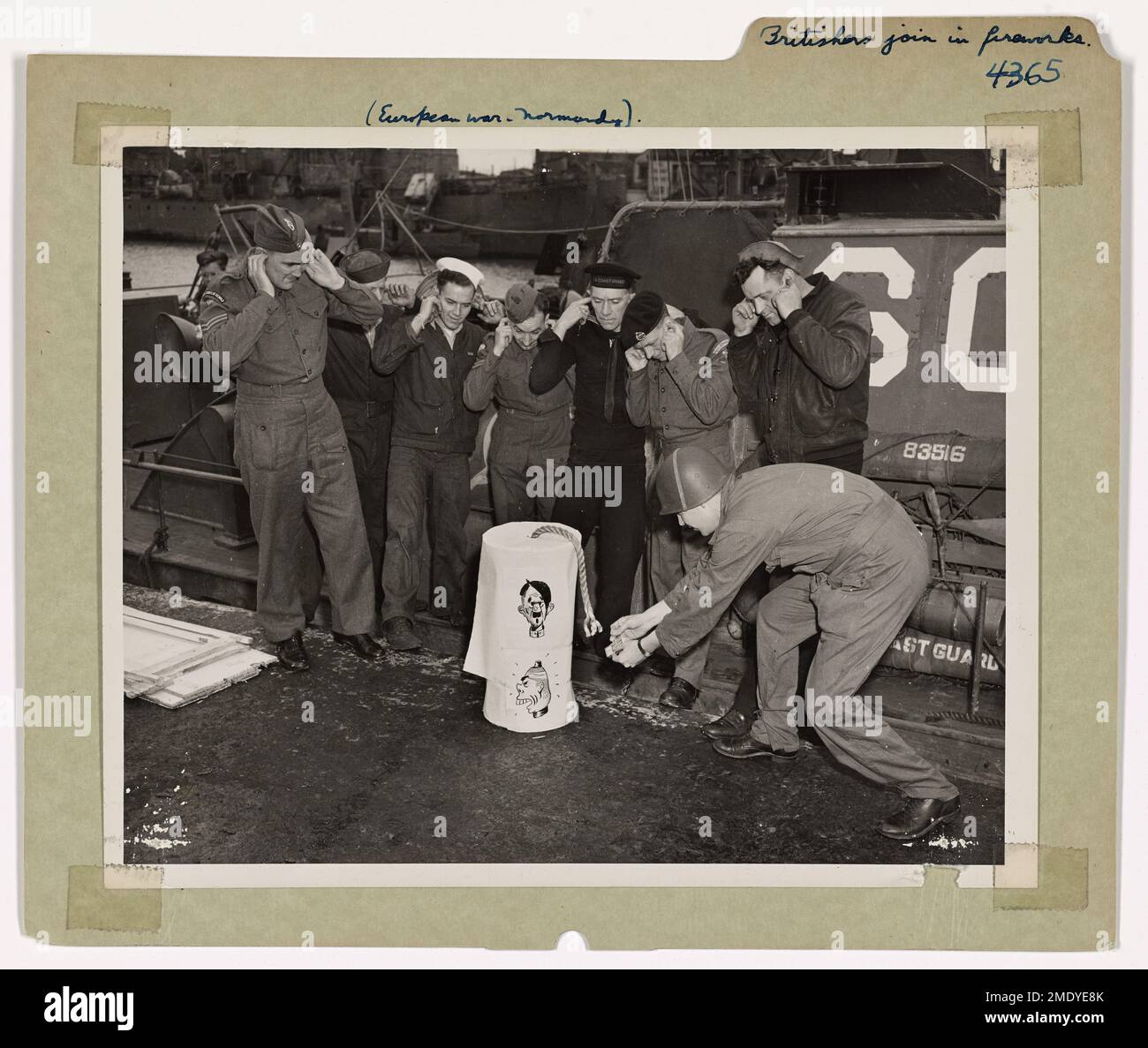 Coast Guardsmen and British soldiers celebrate the Fourth of July in ...