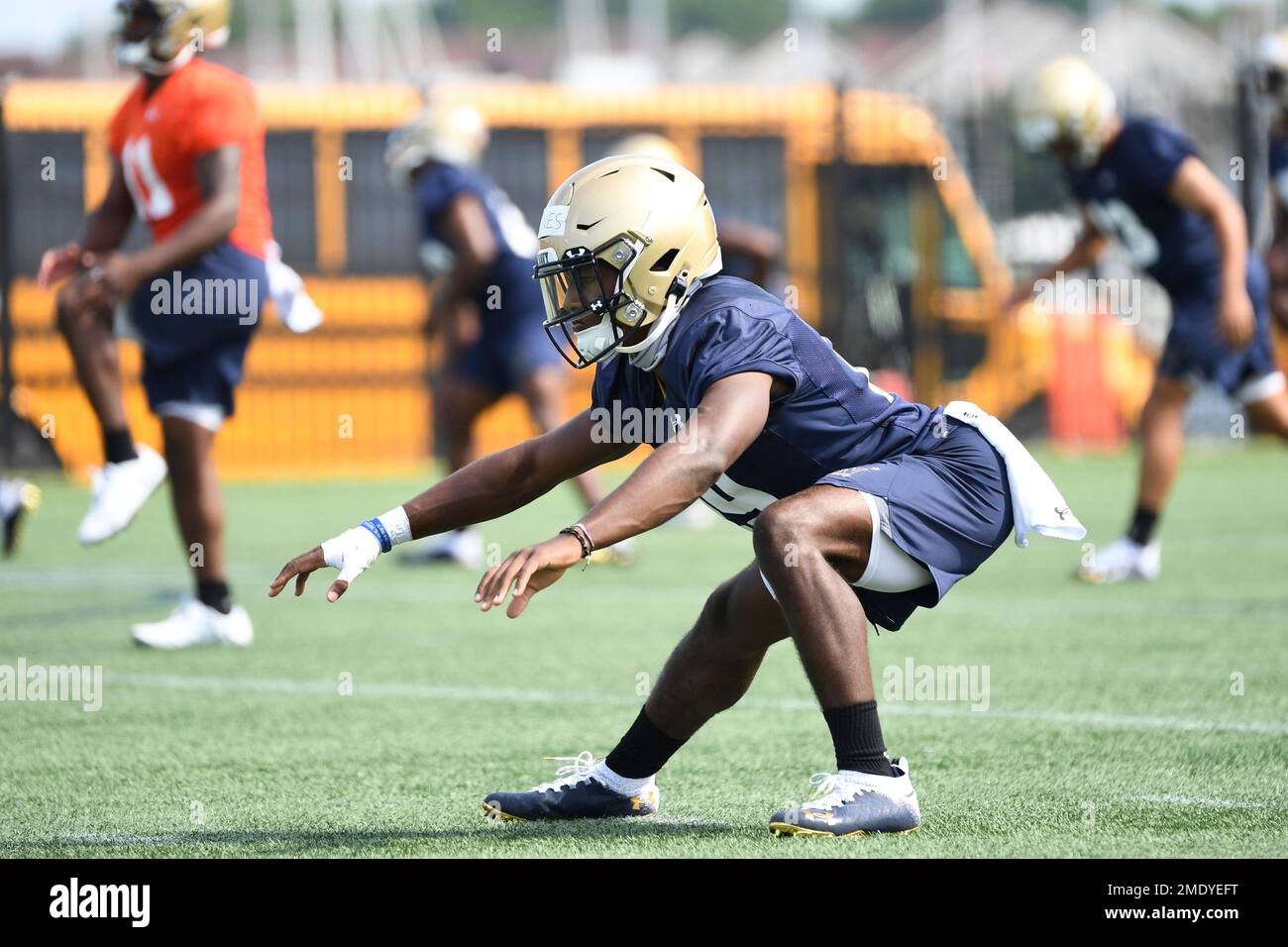 Navy running back Daniel Jones (29) stretches during work outs for the ...