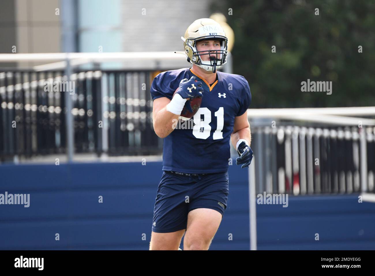 Navy wide receiver Michael Naze (81) runs with the ball during work ...
