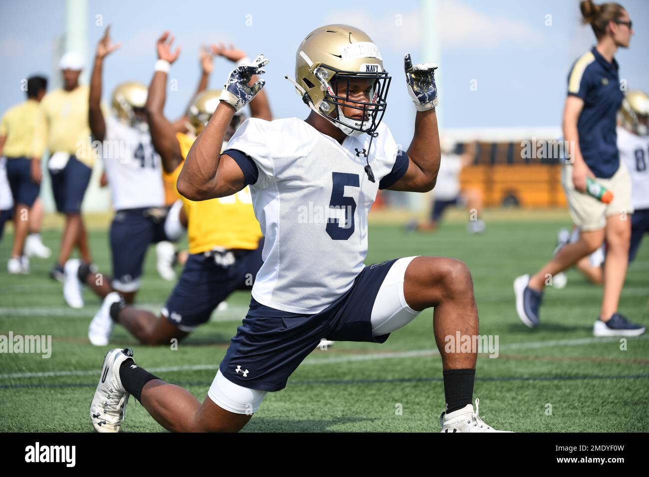 Navy cornerback Michael McMorris (5) stretches during NCAA college ...