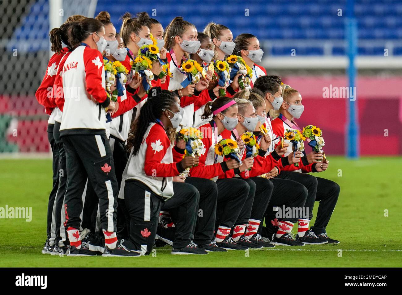 Players of Canada pose with their gold medals after beating Sweden in ...