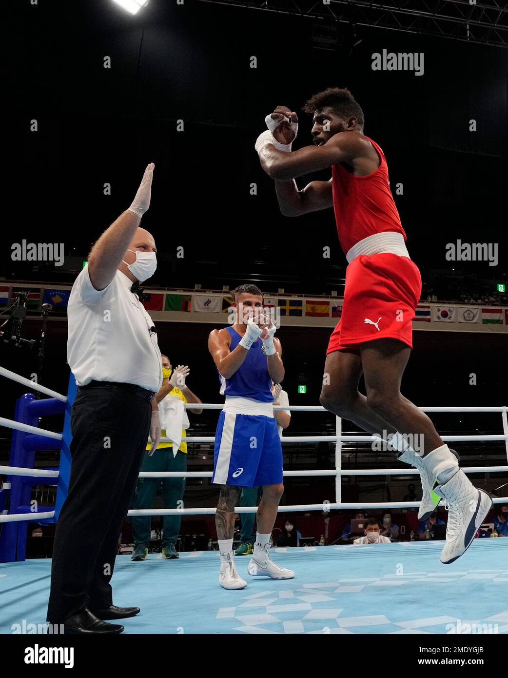 Cuba's Andy Cruz, right, leaps in celebration after defeating Australia ...