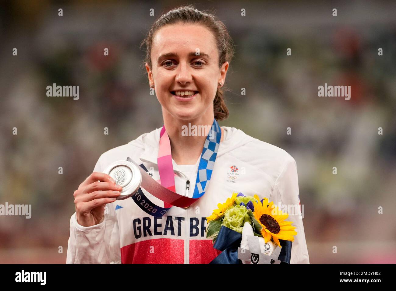Silver medalist Laura Muir, of Britain, poses during the medal ceremony ...
