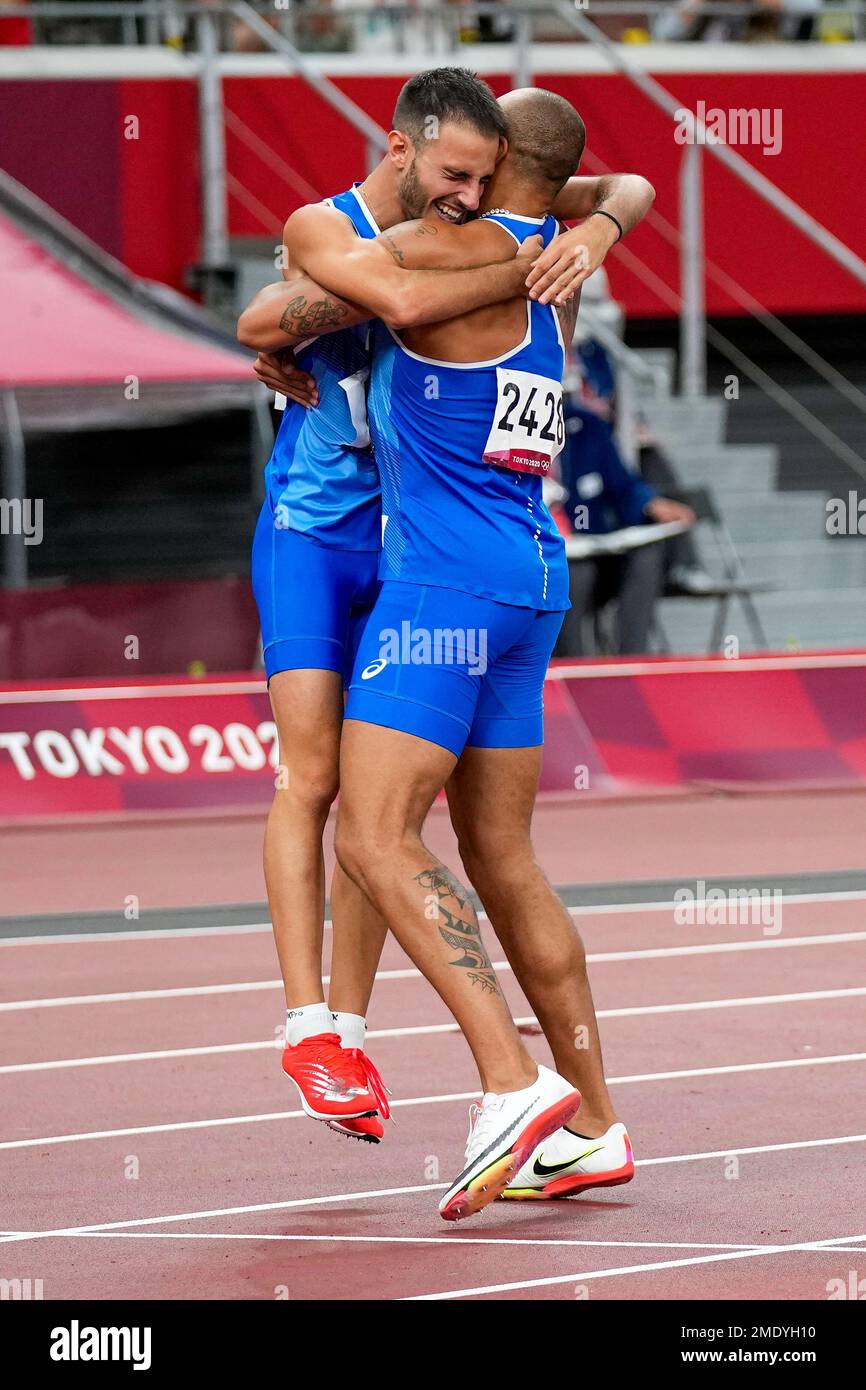 The team from Italy celebrates after winning the gold medal in the men ...