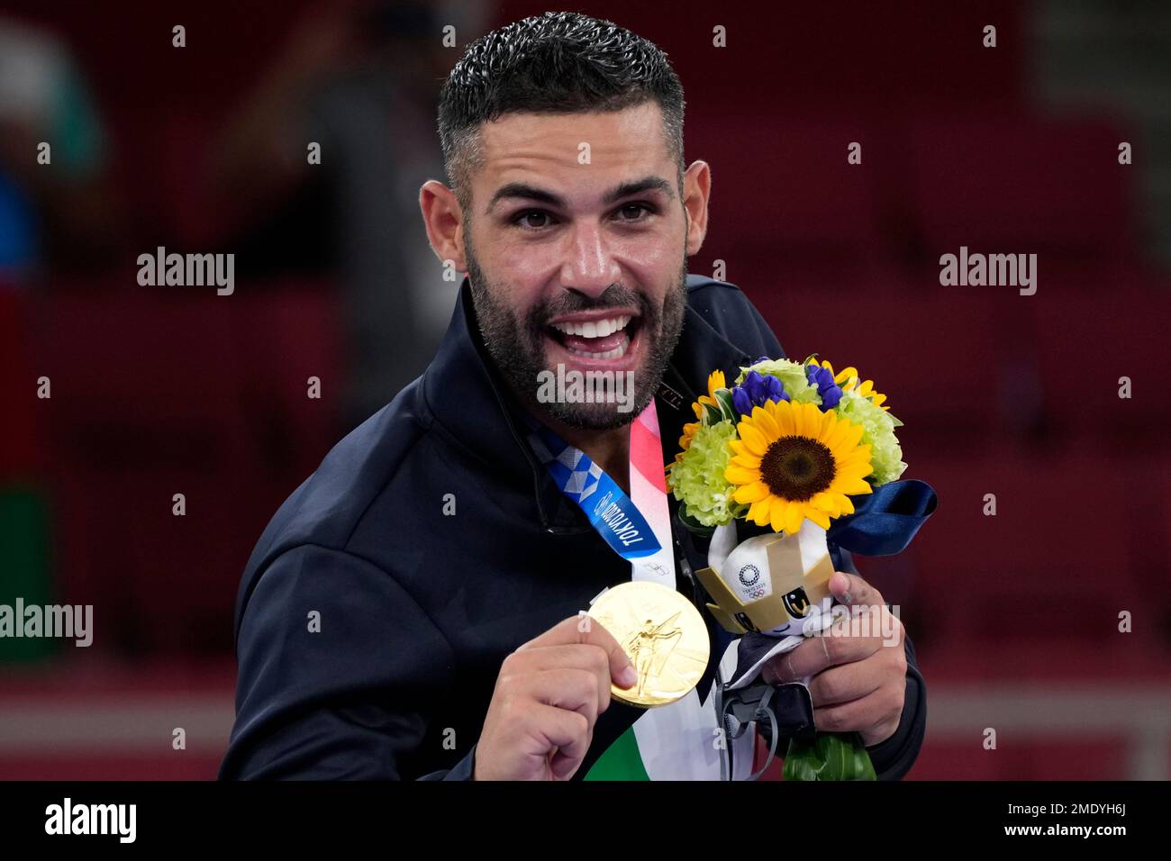 Gold medalist Luigi Busa of Italy poses during the medal ceremony for ...