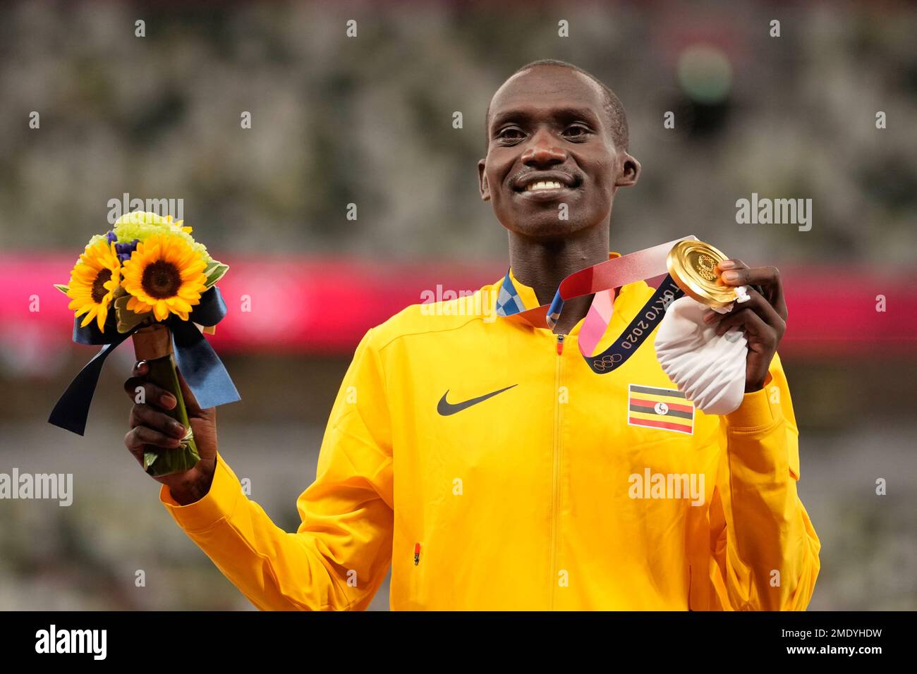 Gold medalist Joshua Cheptegei, of Uganda, poses during the medal ...