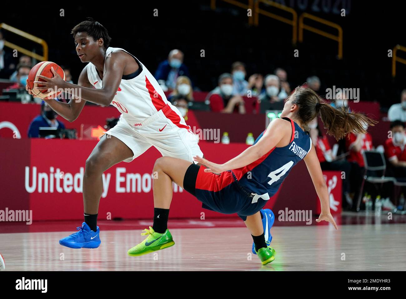 Japan's Evelyn Mawuli (30) is fouled by France's Marine Fauthoux (4 ...