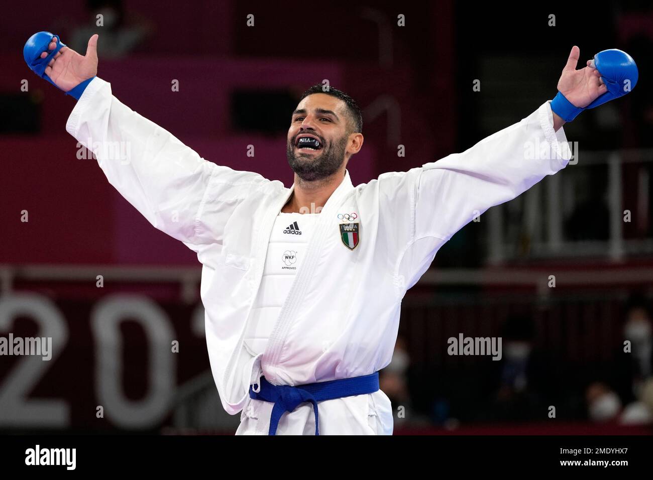 Luigi Busa of Italy reacts after competing in his men's kumite -75kg ...