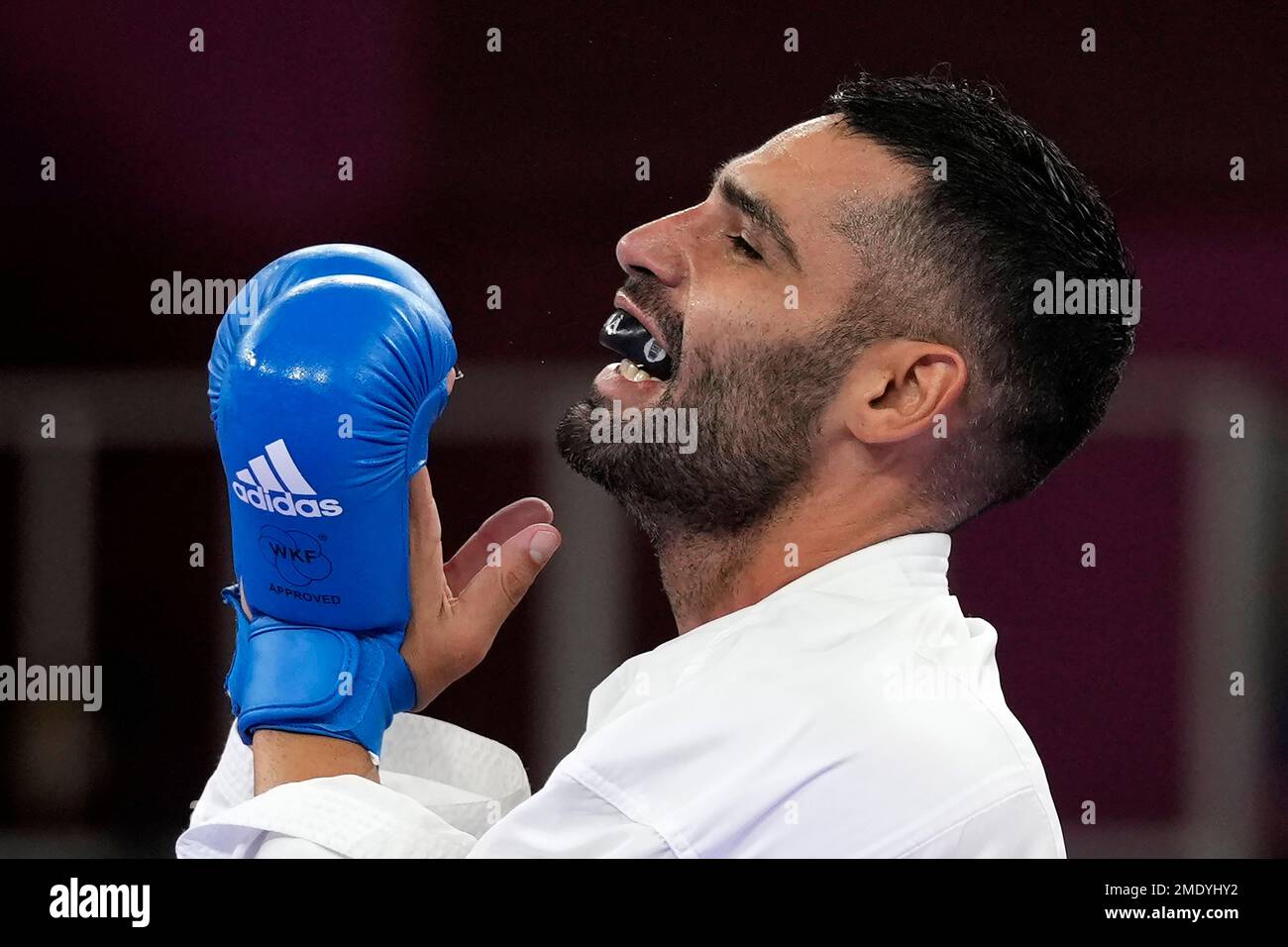 Luigi Busa of Italy reacts after competing in his men's kumite -75kg ...