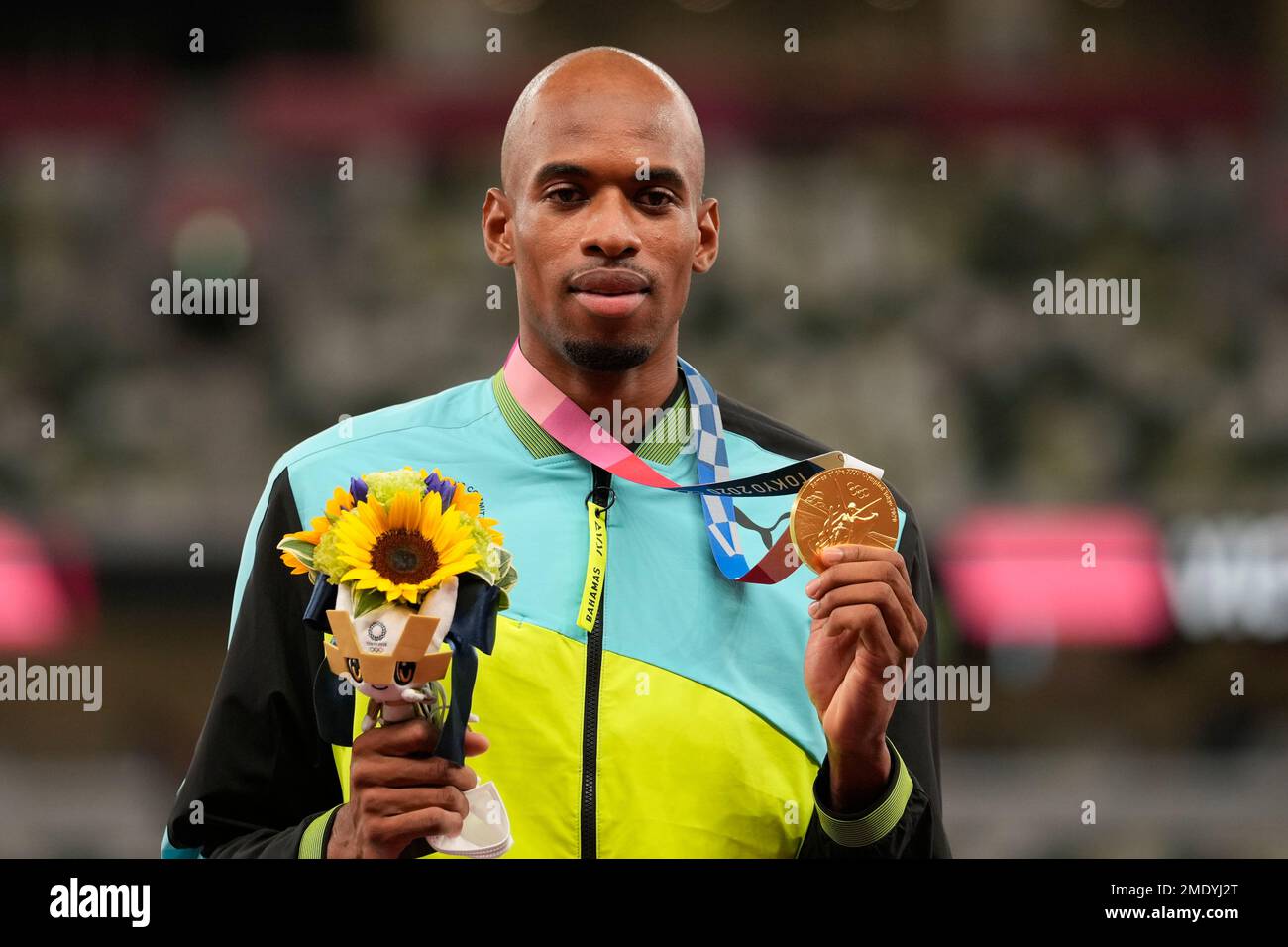 Gold medalist Steven Gardiner, of the Bahamas, poses during the medal ...