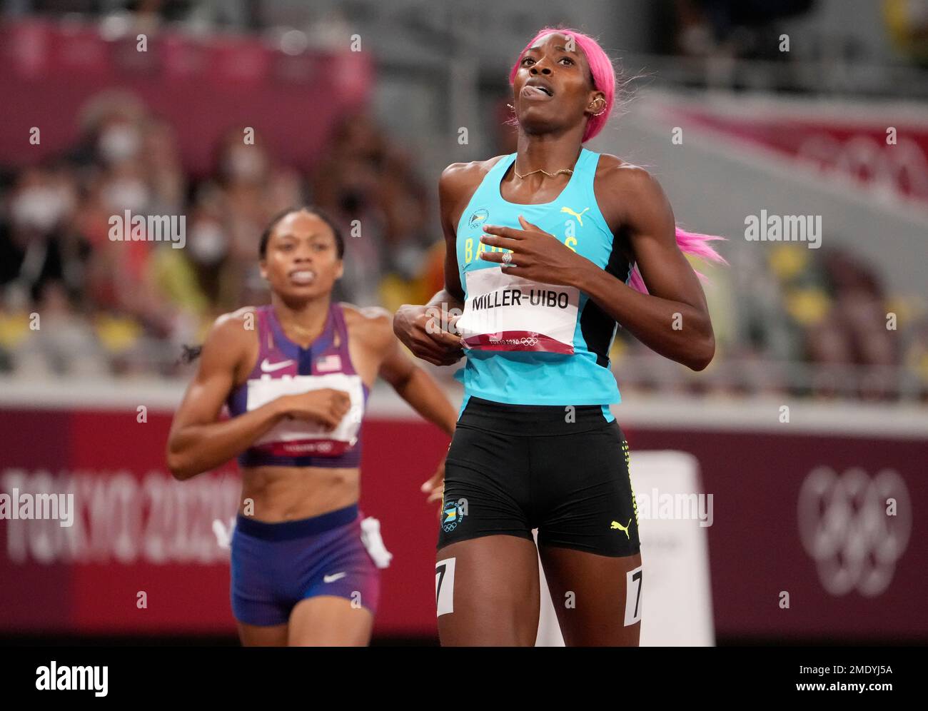 Shaunae Miller-Uibo, of Bahamas crosses the line to win the gold medal ...