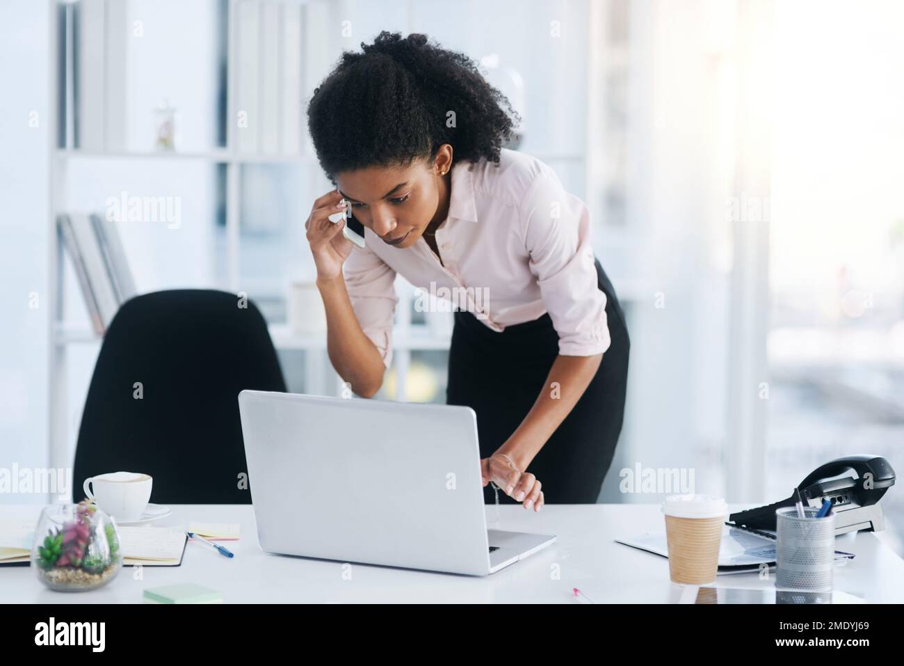 Let me check if your email came through yet...a young businesswoman ...