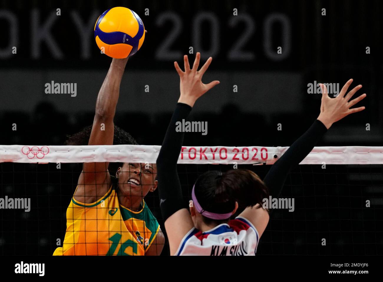 Brazil's Fernanda Garay Rodrigues spikes a ball against South Korea's ...