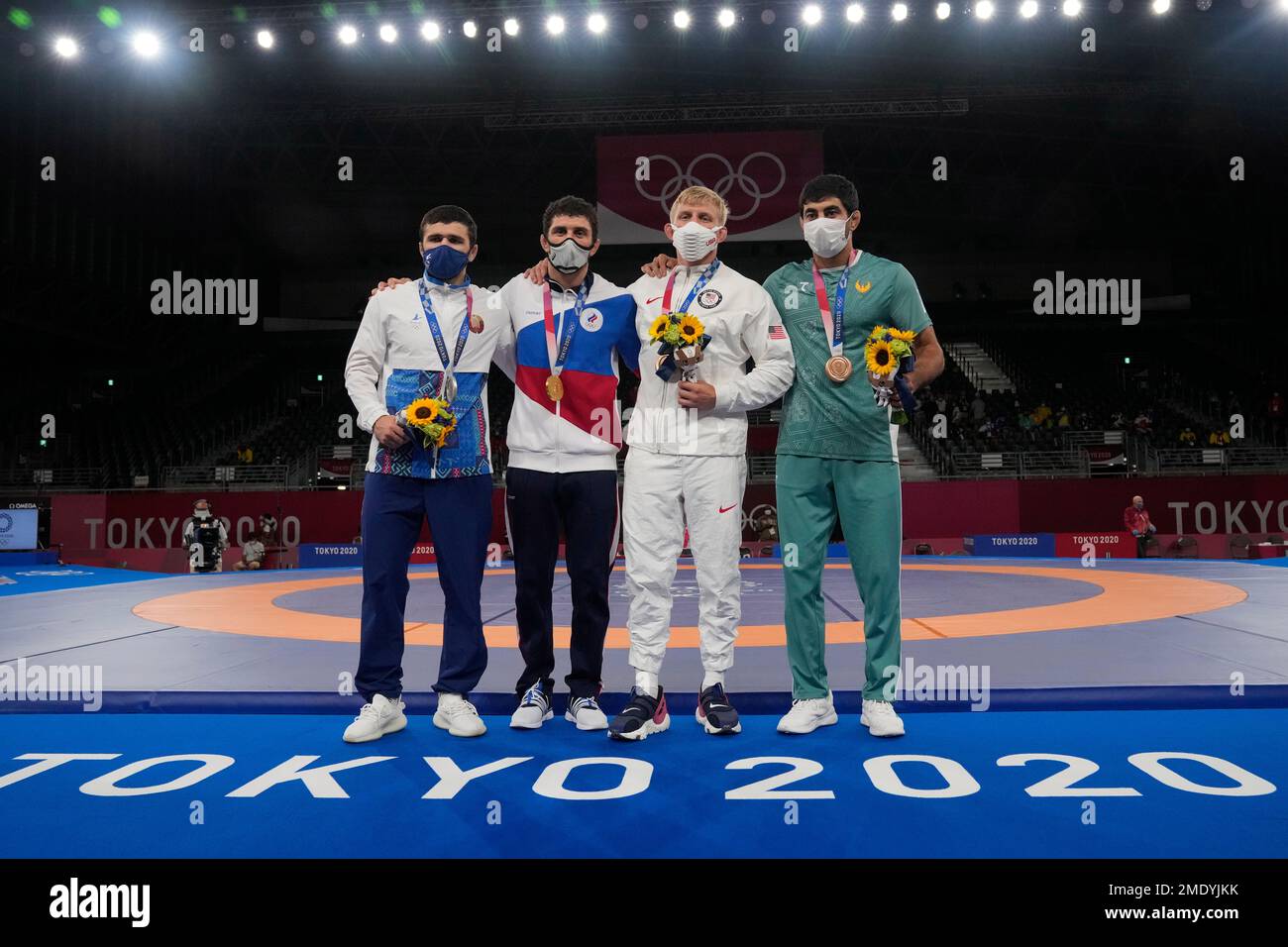 Medalists, from left to right, Belarus' Mahamedkhabib Kadzimahamedau, silver, Russian Olympic ...