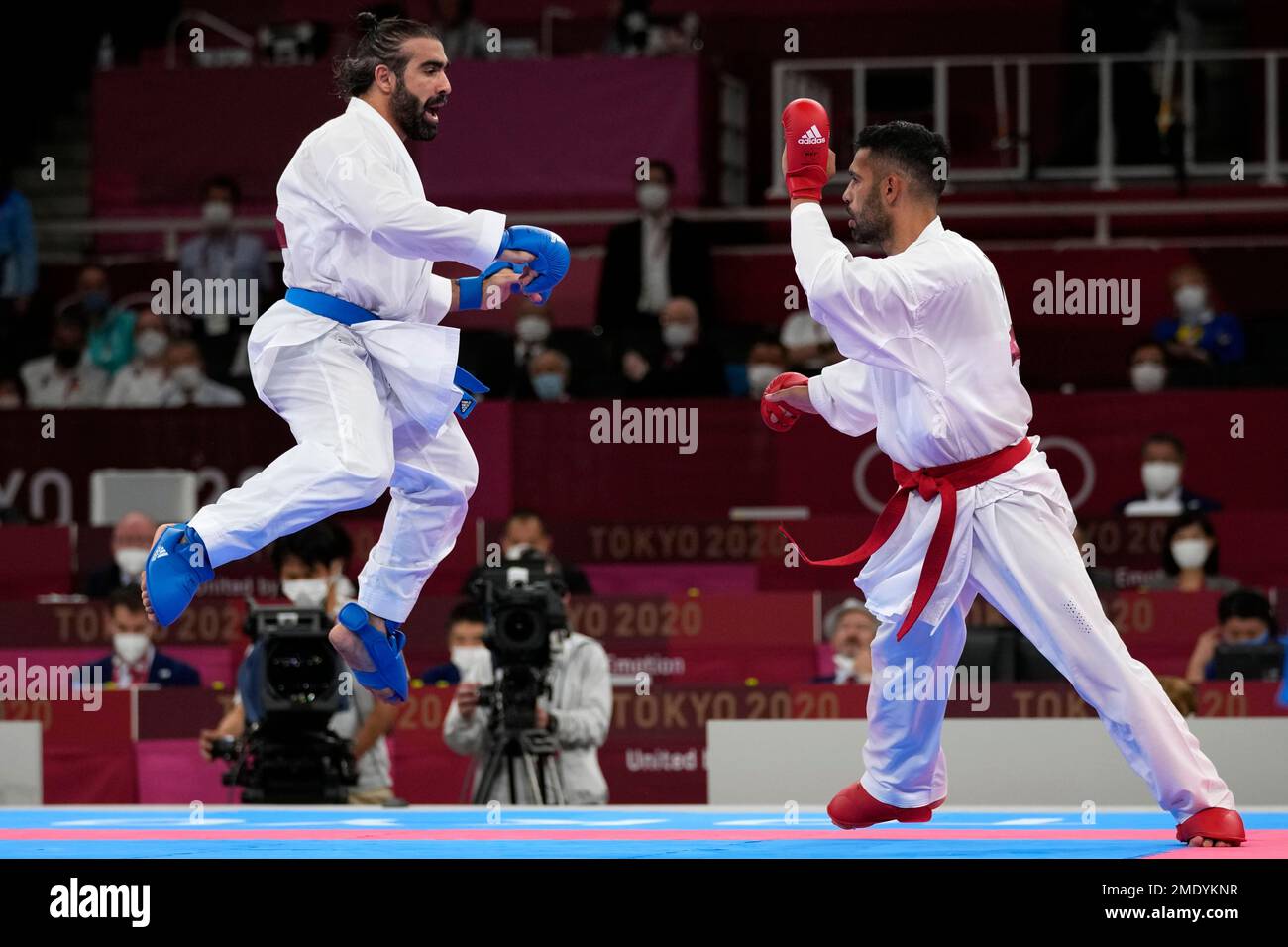Rafael Aghayev of Azerbaijan, left, and Luigi Busa of Italy compete in ...