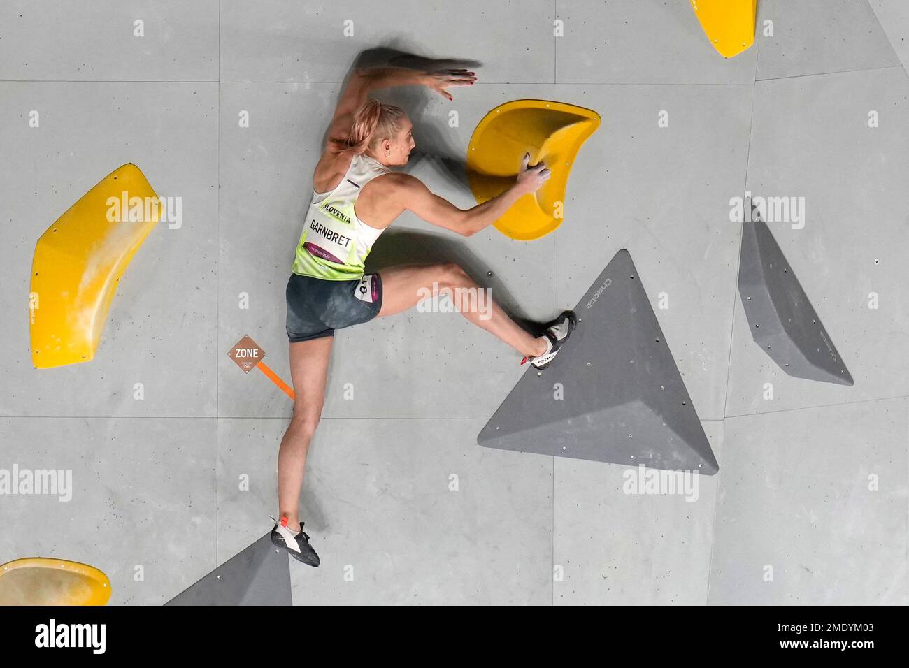 Janja Garnbret, of Slovenia, competes during the bouldering portion of ...